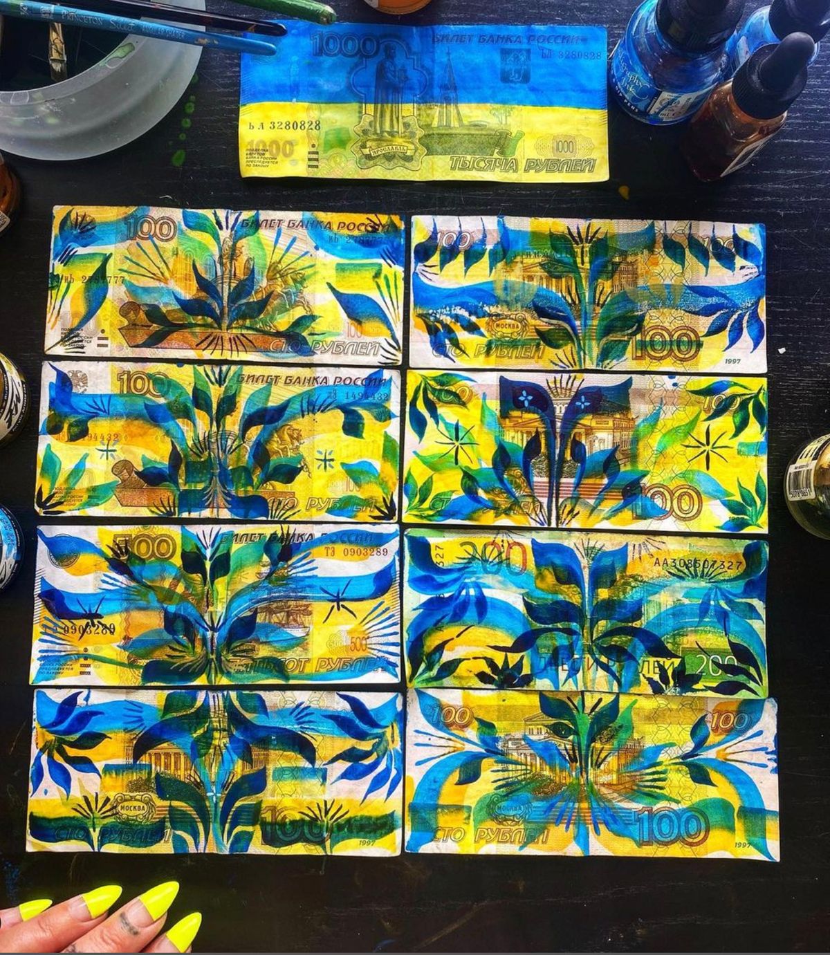 Scores Of Artists Deface Russian Rubles In NFT Project For Ukraine Scores Of Artists Deface Russian Rubles In NFT Project For Ukraine